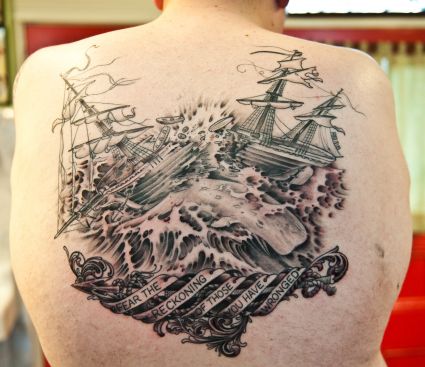 Eric Tattoos Design On Back || Tattoo from Itattooz